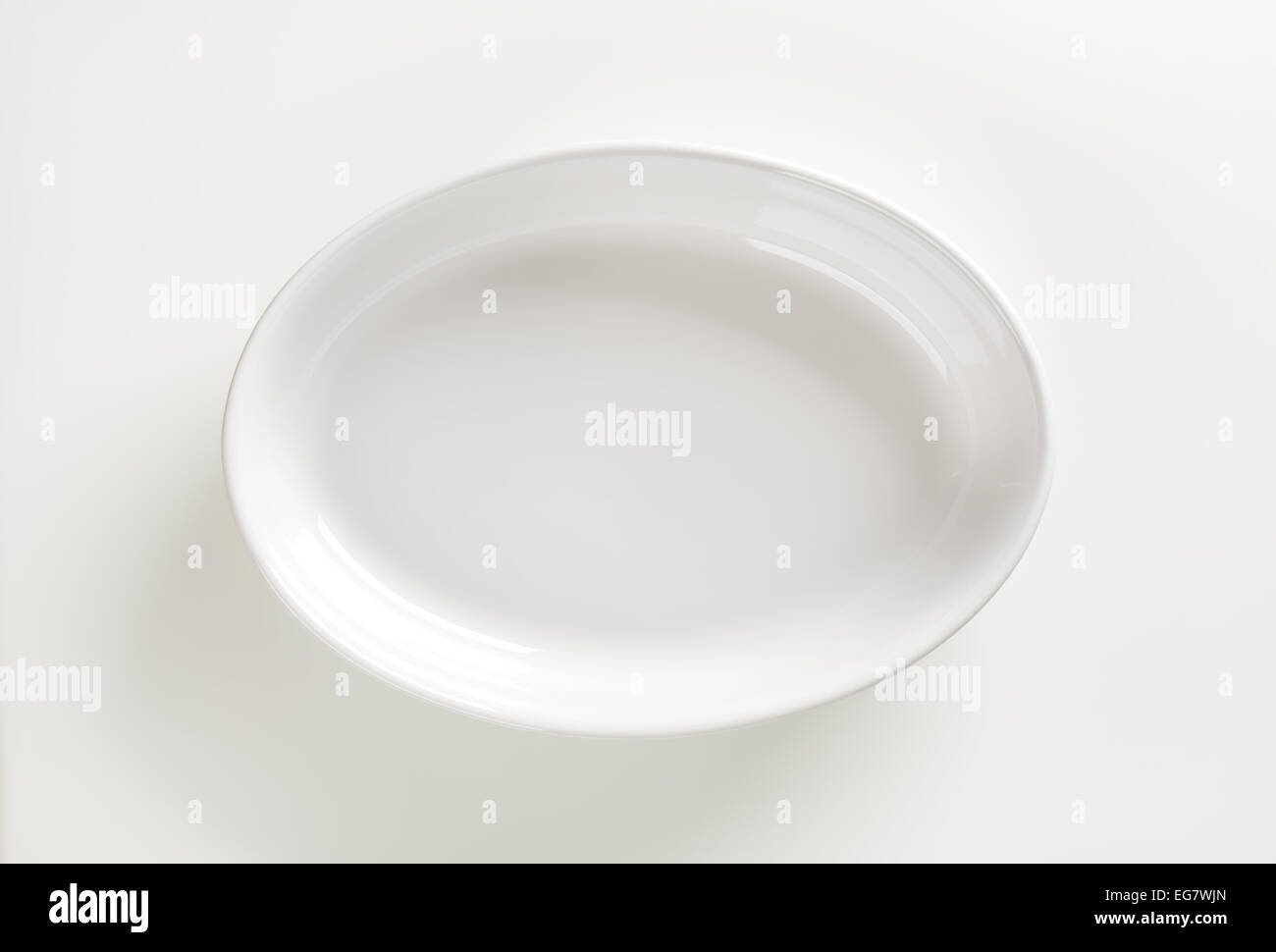Empty deep oval porcelain dish Stock Photo - Alamy