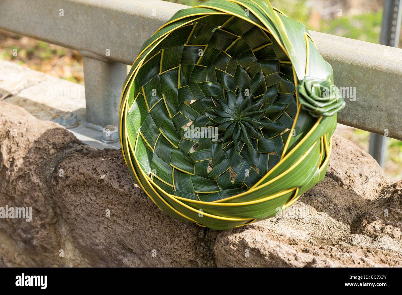 Palm leaf woven basket with a rose just made by a local artist in Kauai ...