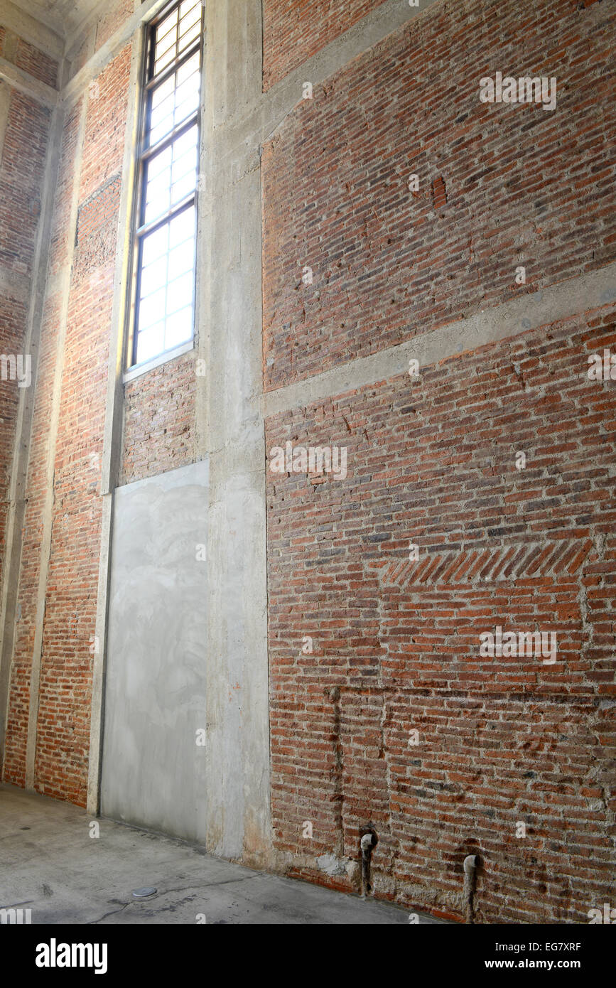 Sunlight from window on the brick walls inside of old building Stock ...