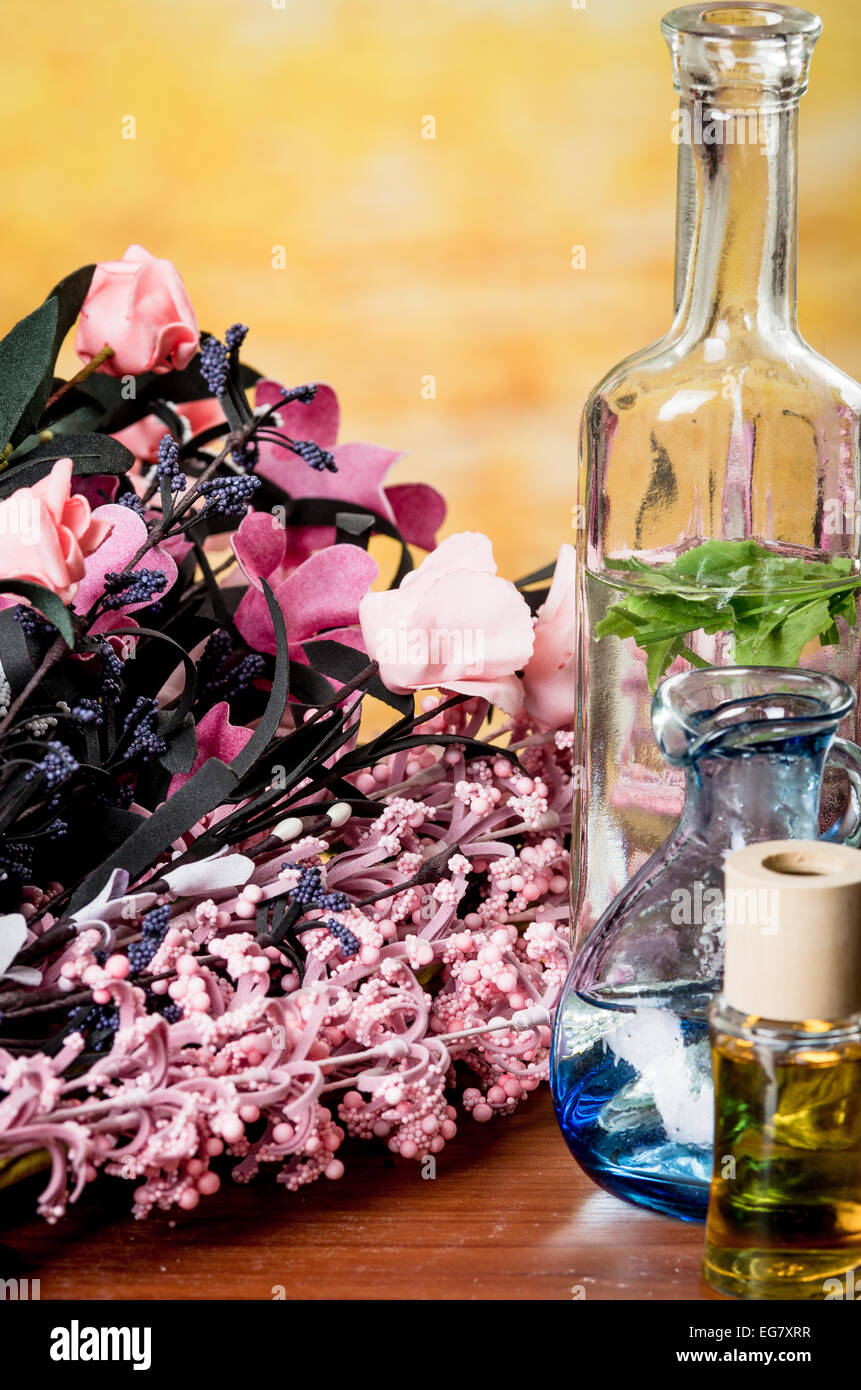 glass bottles oils stones spa concept Stock Photo - Alamy