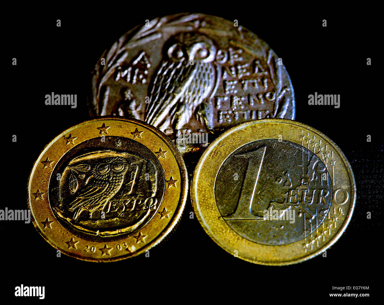 Bonn, Germany. 18th Feb, 2015. ILLUSTRATION - Two Greek Euro coins lie ...