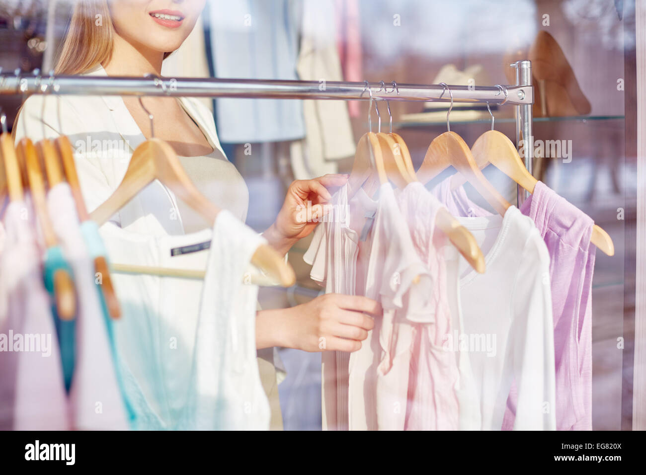 Beautiful young woman choosing hi-res stock photography and images - Alamy
