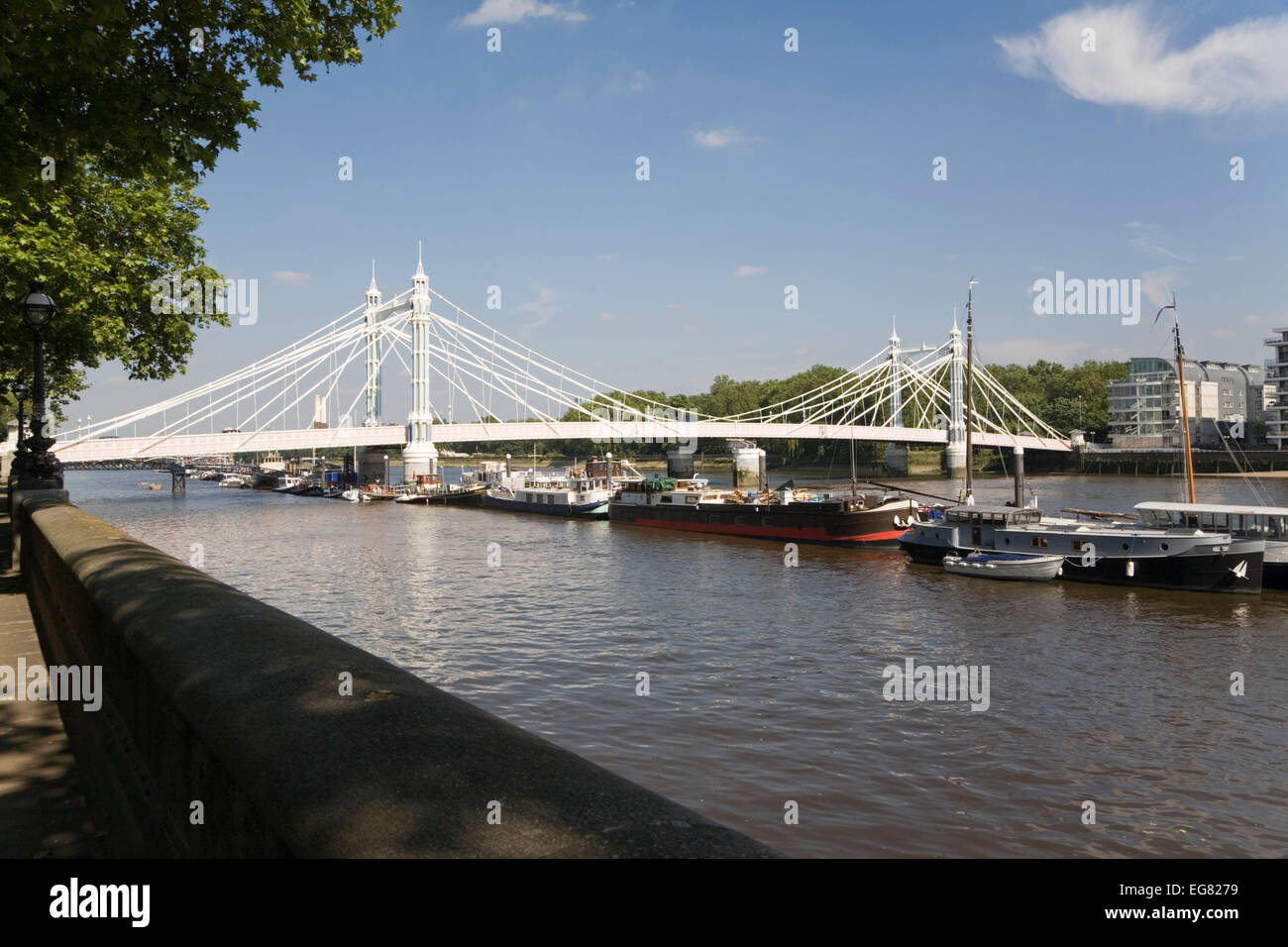 Chelsea Bridge, London, England from an embankment along the River ...
