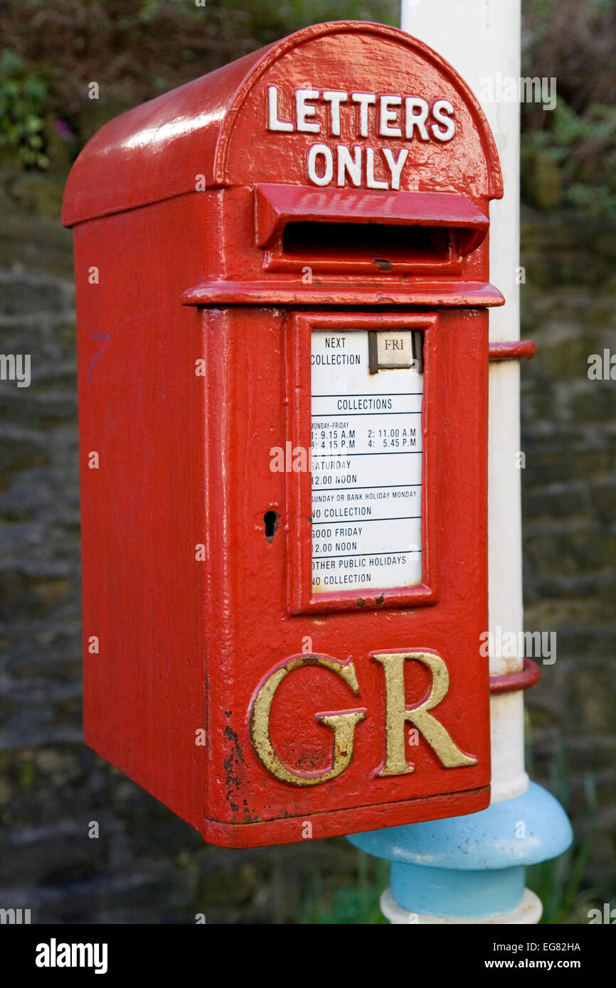 George V Post-box, or mailbox in an English village. It marks the reign ...