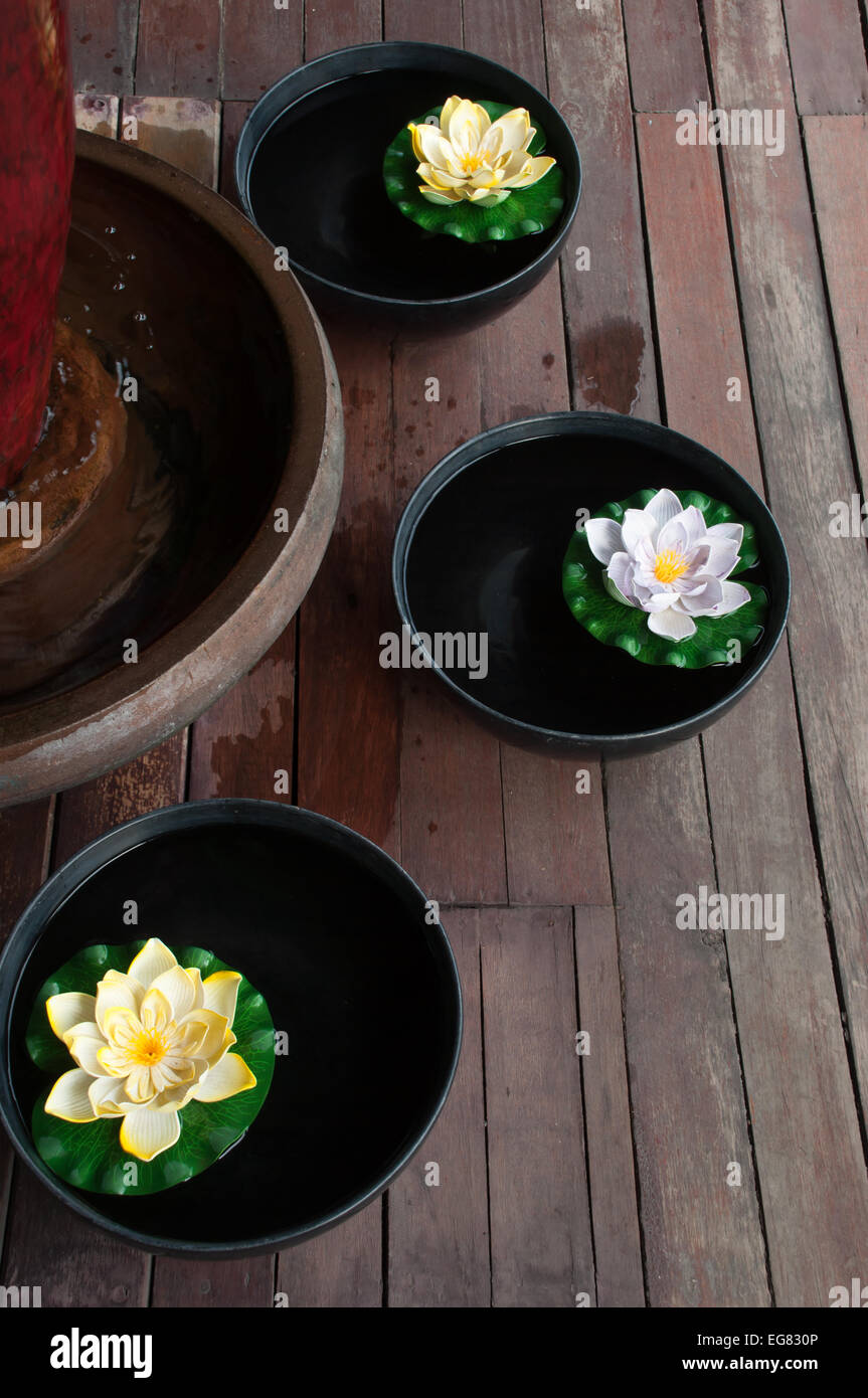 Spa still life with lotus flower and wood Stock Photo - Alamy