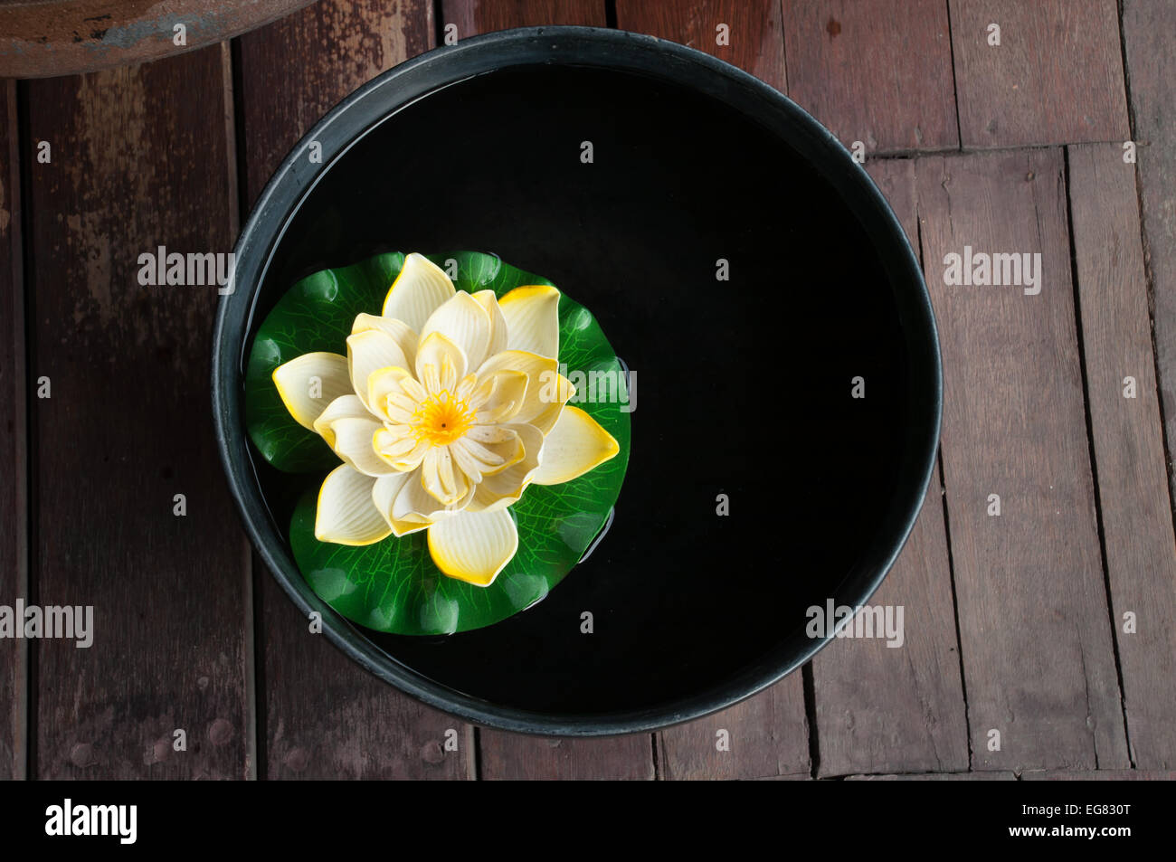 Spa still life with lotus flower and wood Stock Photo - Alamy