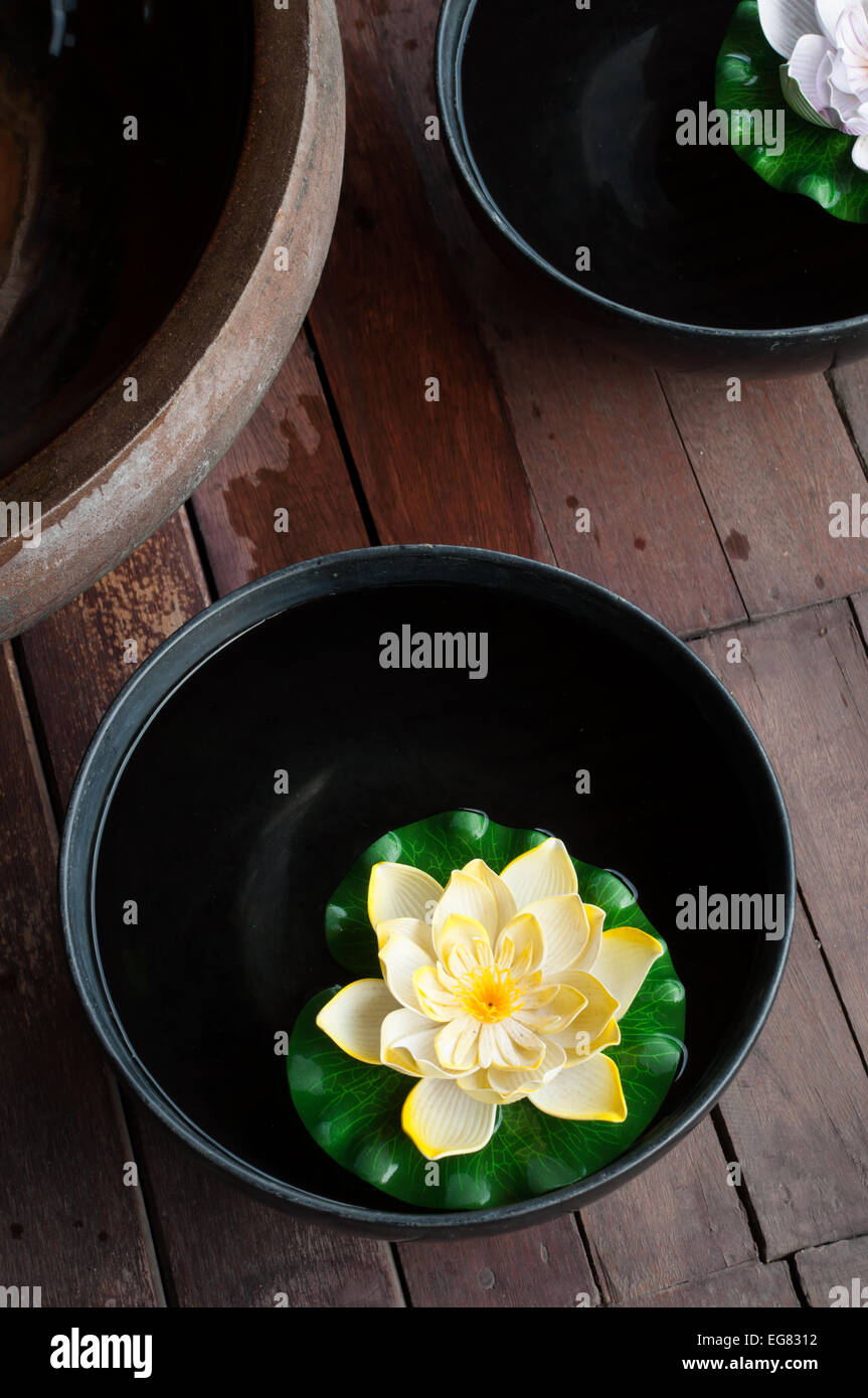 Spa still life with lotus flower and wood Stock Photo - Alamy