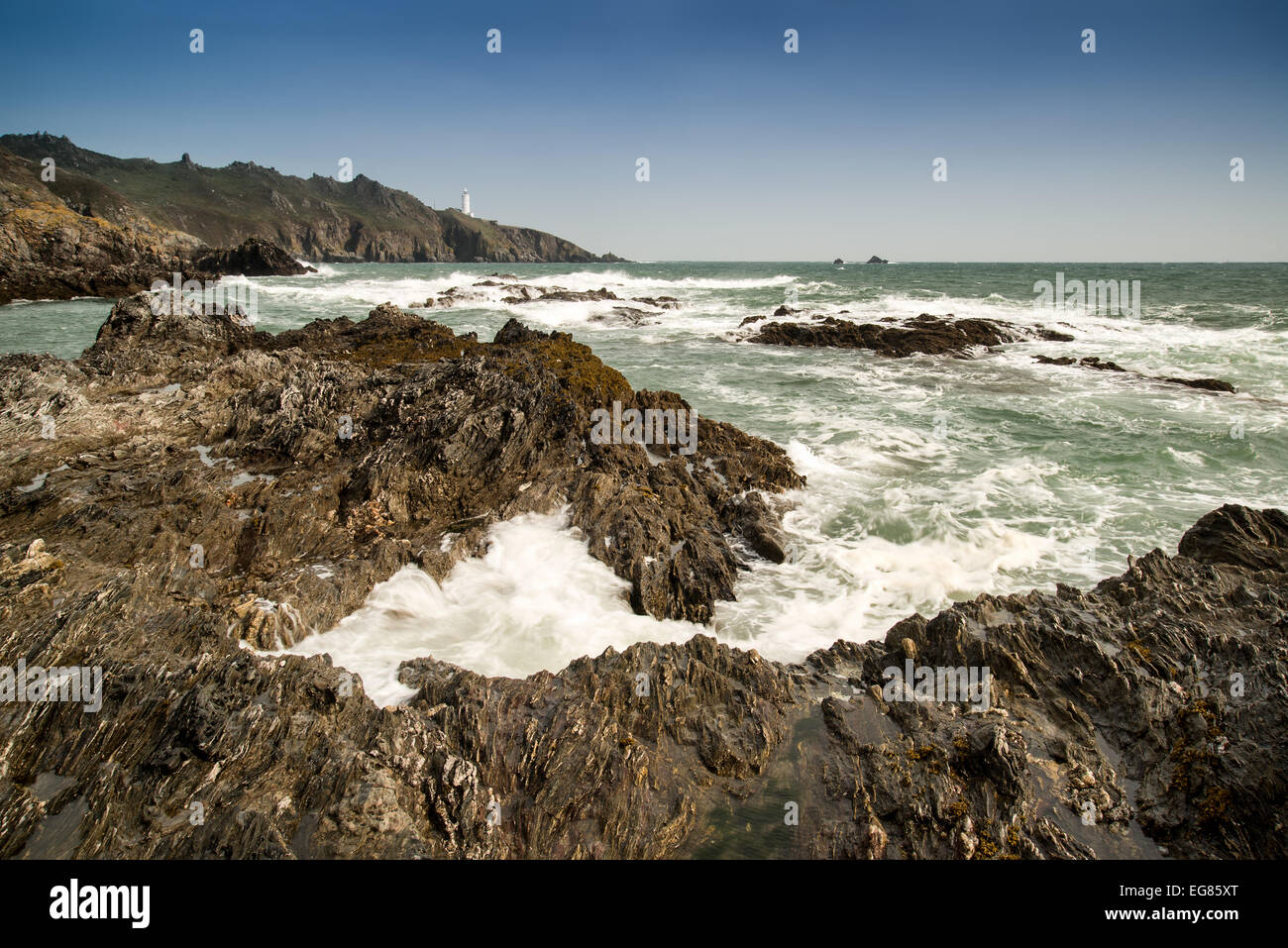 Start Point lighthouse with rugged sea landscape Stock Photo - Alamy