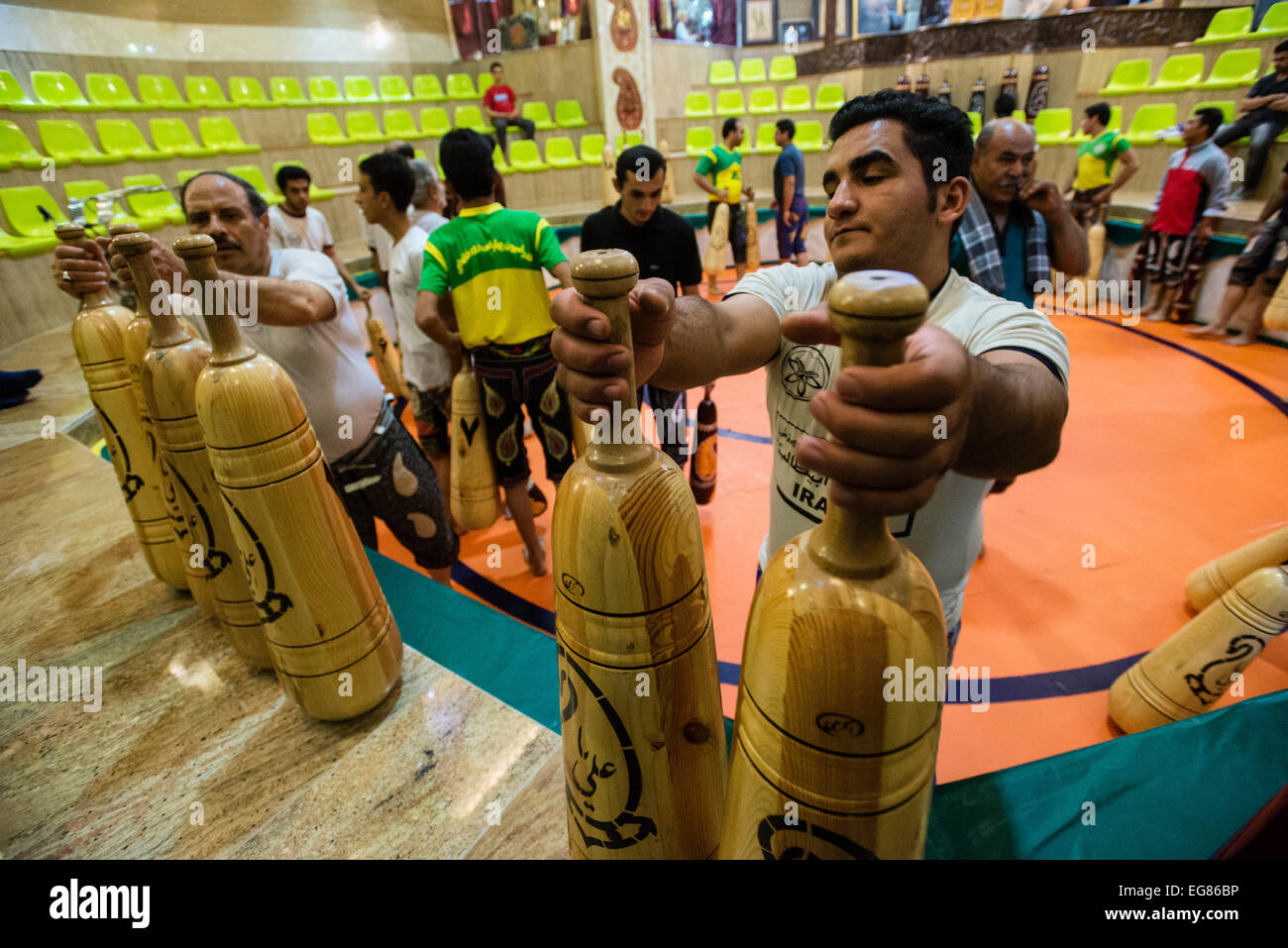 Iranian wrestlers, take meels, wooden clubs with weight from 9 to 18 ...