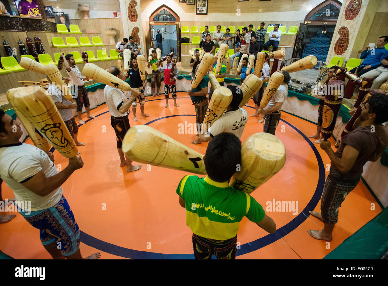 Wrestlers training with meels, wooden clubs with weight from 9 to 18 ...