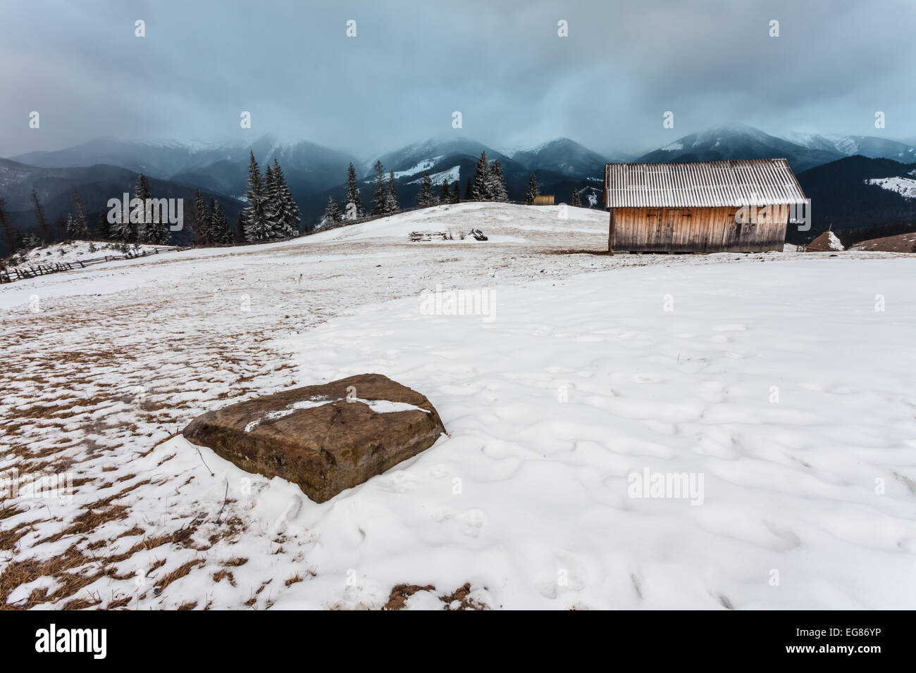 Hut in the snow. background with snowy landscape. Ukraine Stock Photo ...