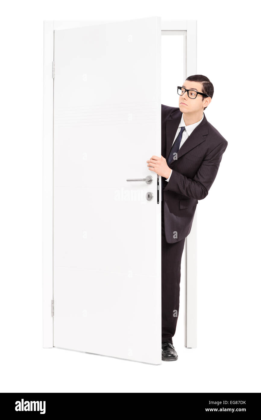 Man peeking door Cut Out Stock Images & Pictures - Alamy