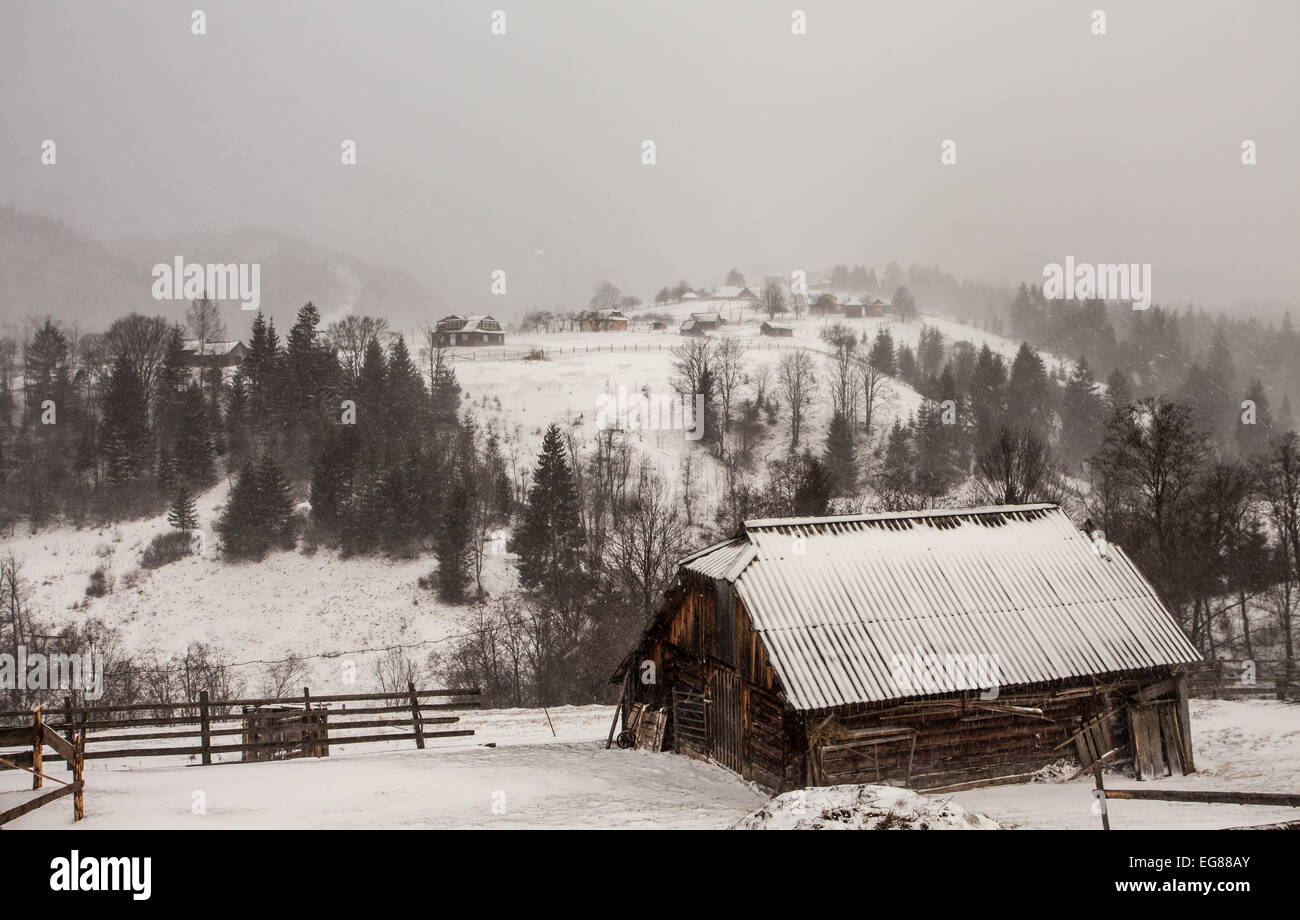 Hut in the snow. background with snowy landscape. Ukraine Stock Photo ...