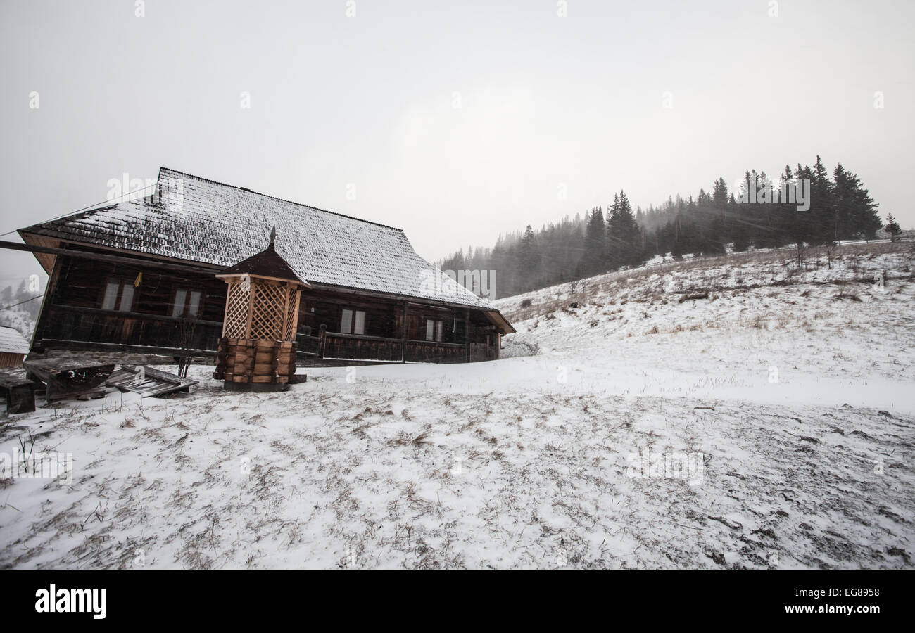 Hut in the snow. background with snowy landscape. Ukraine Stock Photo ...