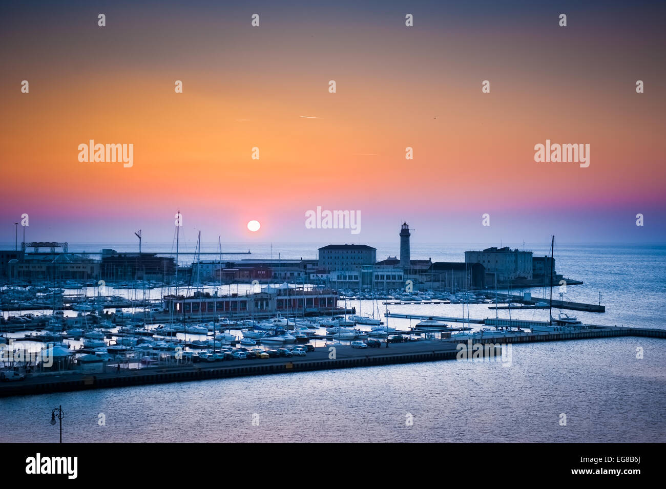 Trieste, Italy - Beautiful sunset over the marina Stock Photo - Alamy