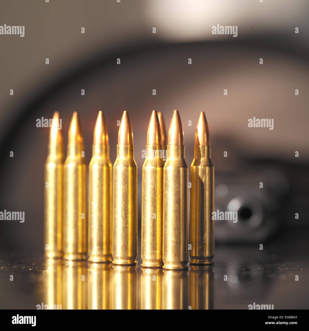 Bullets on a Table Stock Photo - Alamy