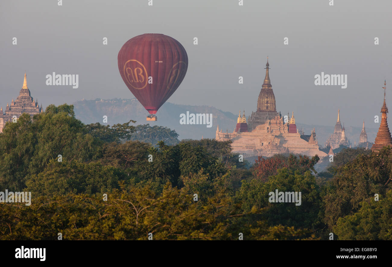 View of sunrise with hot air balloon floating flight over Ananda temple ...