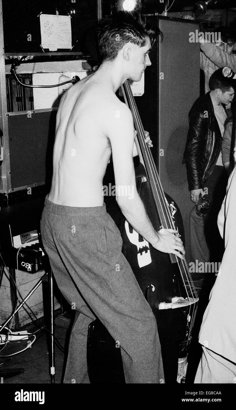 Bass player Nigel Lewis from the psychobilly band The Meteors playing ...