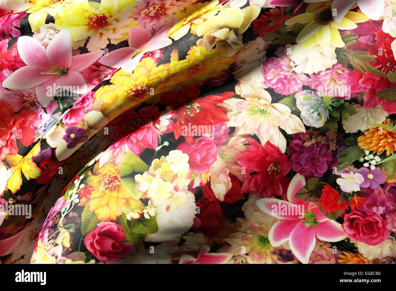 background with lots of colorful flowers over a silk Stock Photo - Alamy