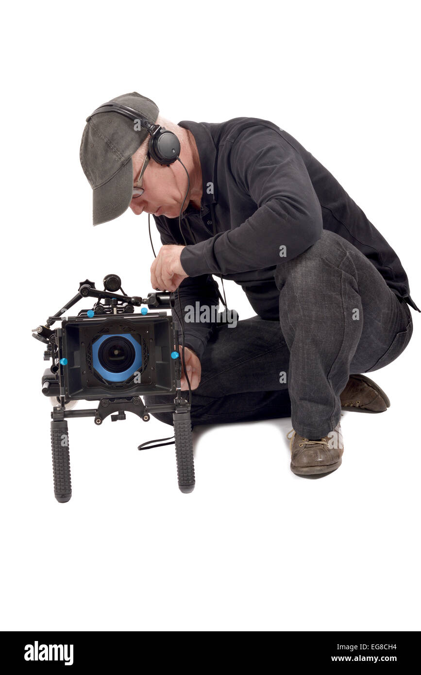 cameraman with his camera to the ground Stock Photo - Alamy