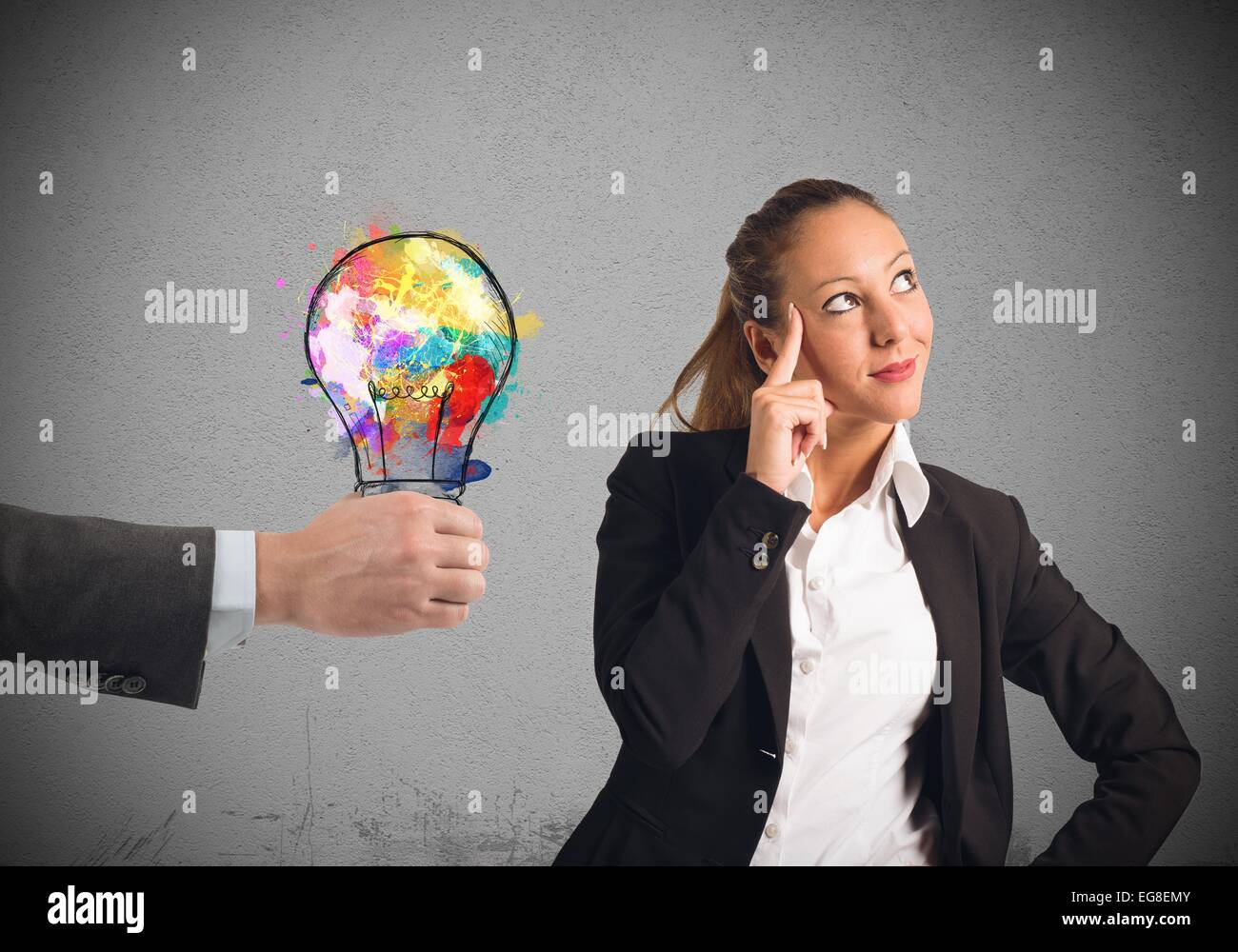 Colleague suggests an idea Stock Photo - Alamy