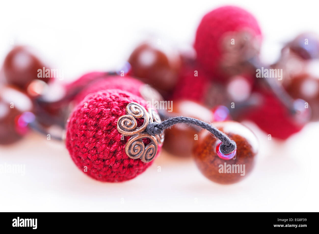 red beads Isolated on white background Stock Photo - Alamy