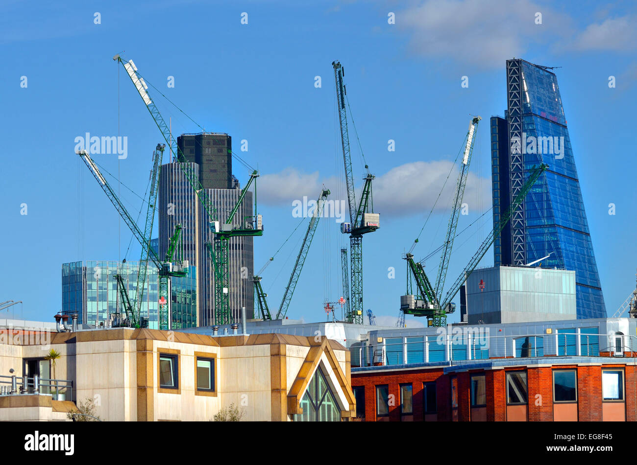 London, England, UK. Construction cranes over the City of London Stock ...