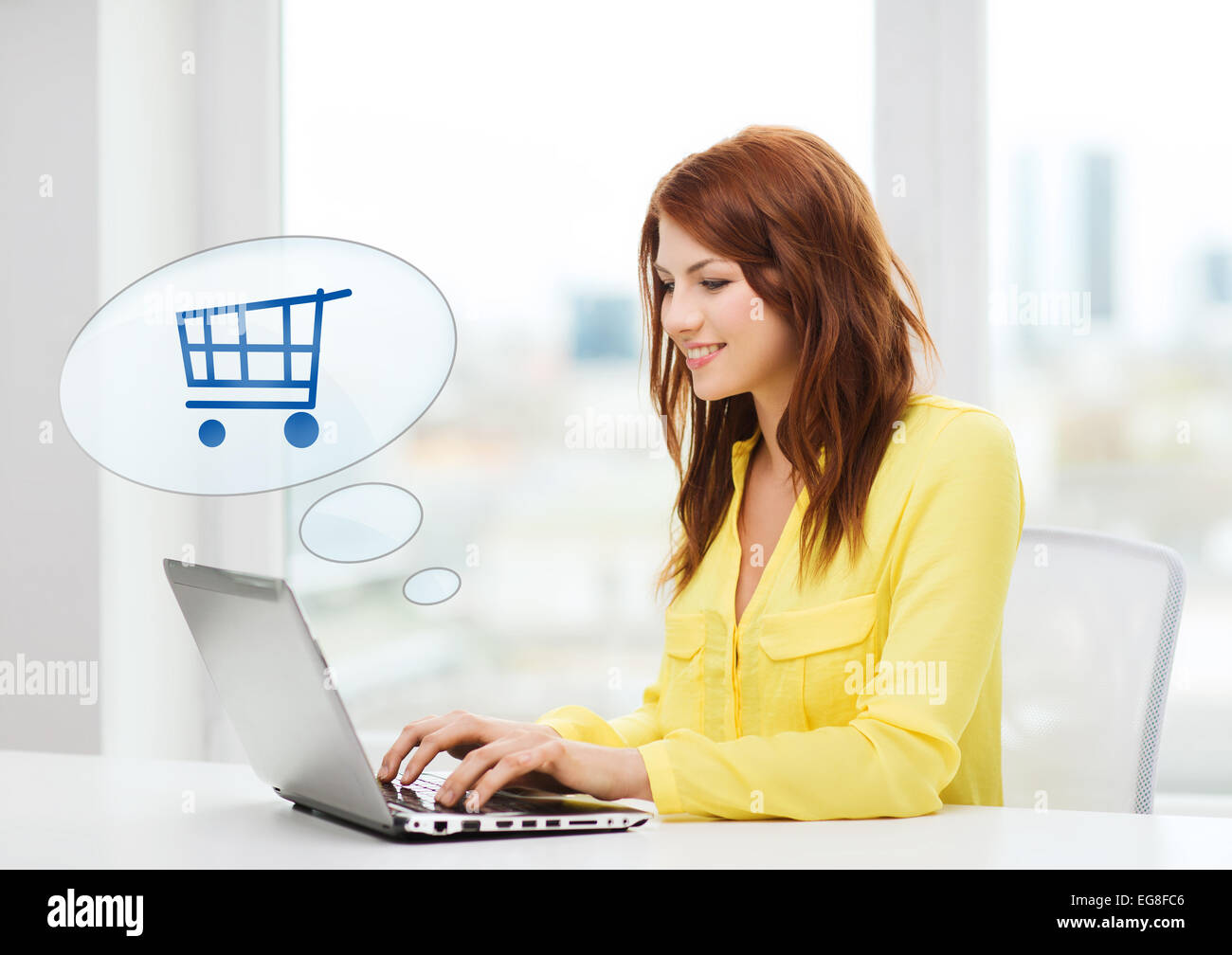 smiling woman with laptop computer shopping online Stock Photo - Alamy