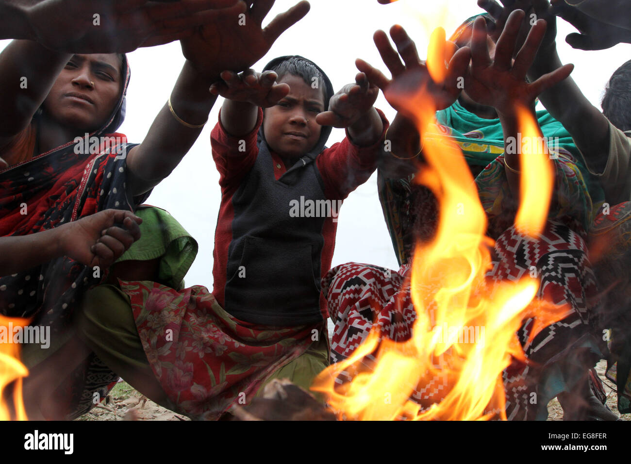 Homeless children create fire by using discarded wood or plastic to ...