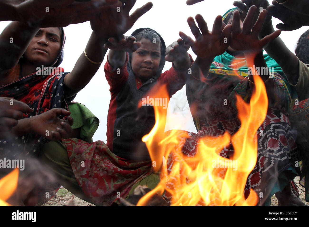 Homeless children create fire by using discarded wood or plastic to ...