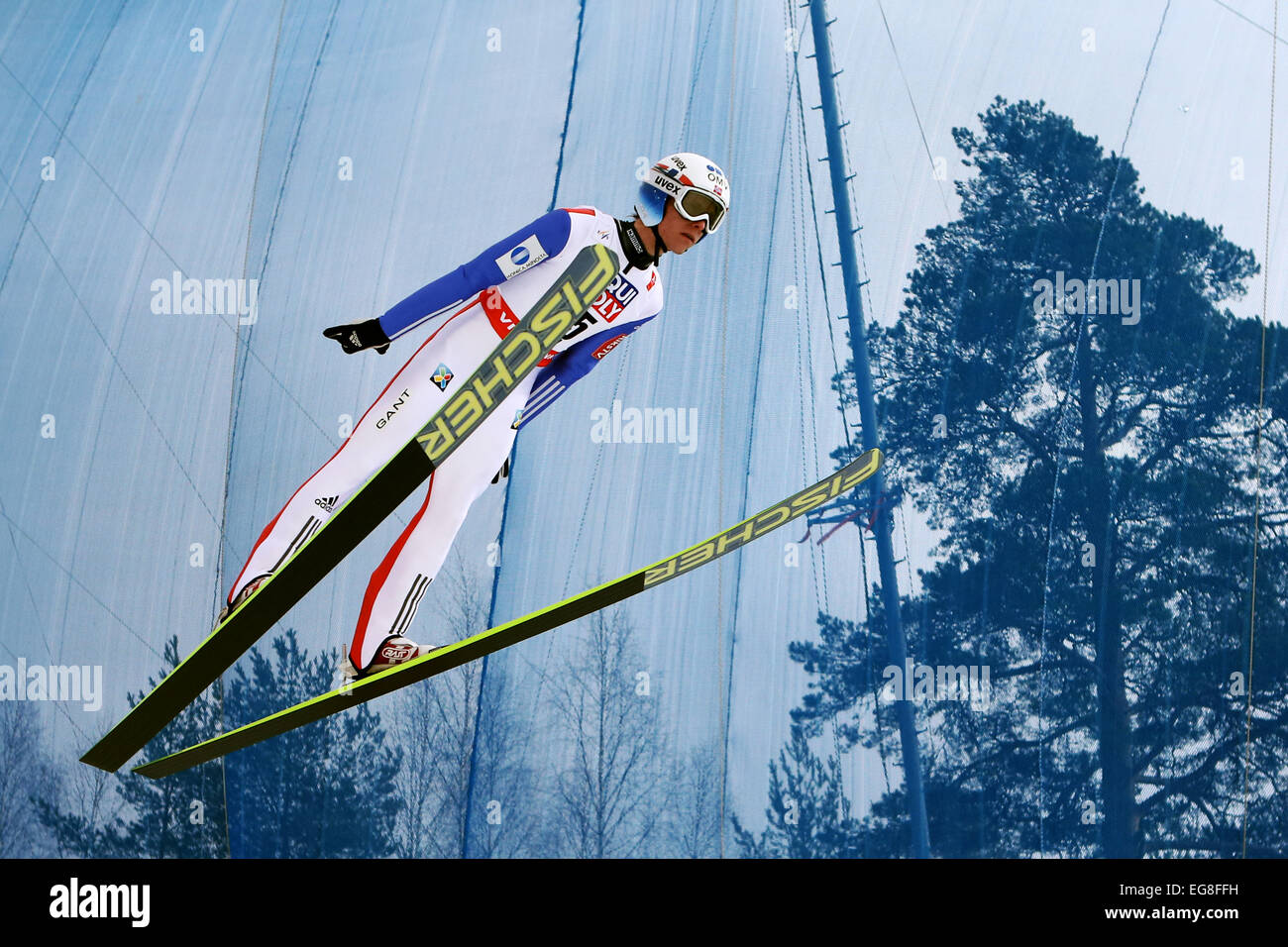Falun, Sweden. 19th Feb, 2015. Rune Velta of Norway soars through the ...