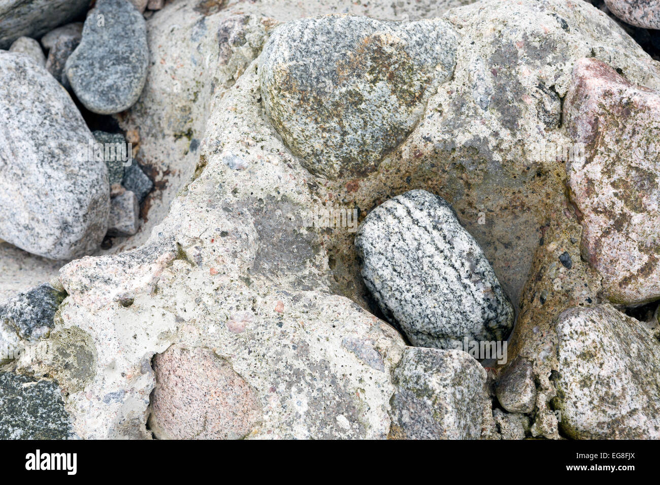 Backgroud image of rocky boulders and pebbles on a Scottish beach Stock ...