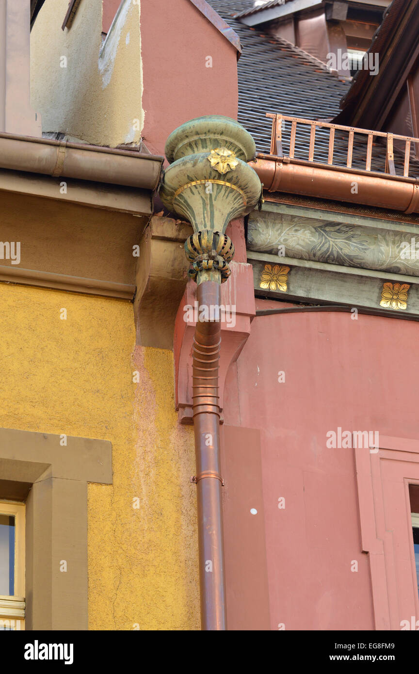 Copper rain gutter, A detail from a decorated rain gutter with ...