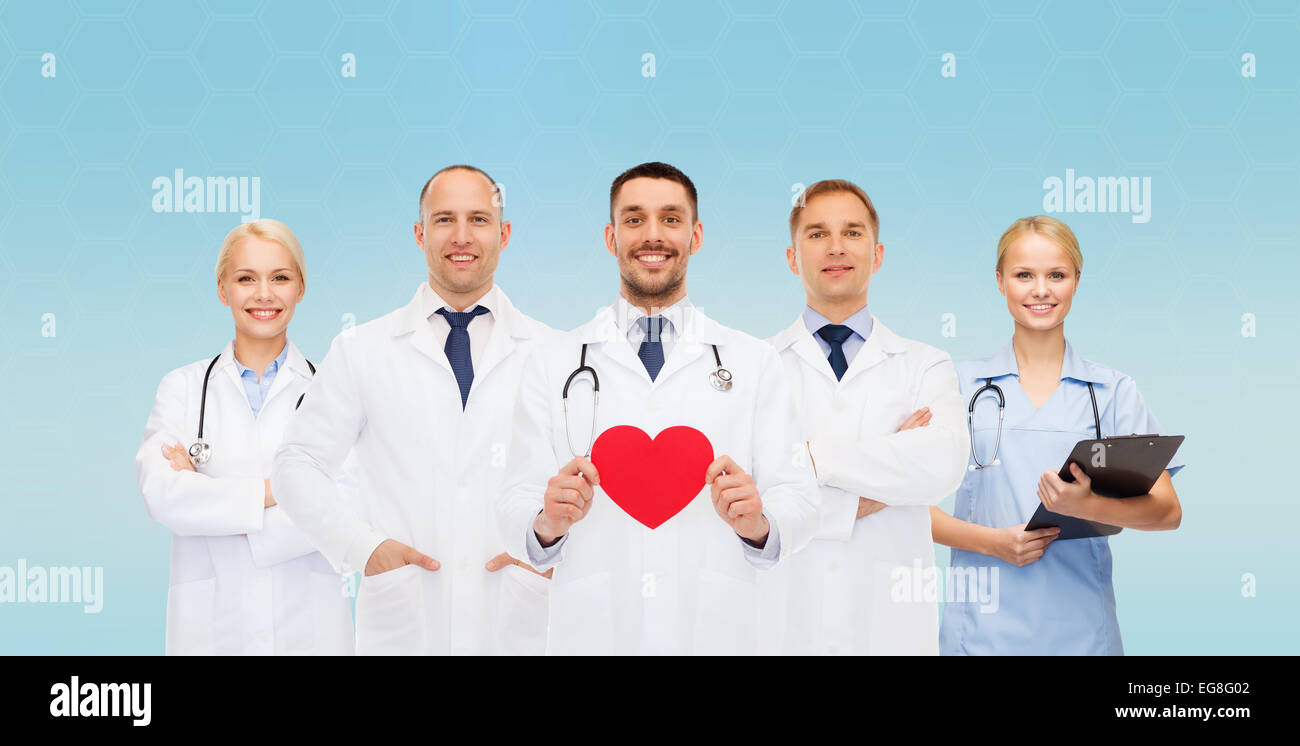 group of smiling doctors with red heart shape Stock Photo - Alamy