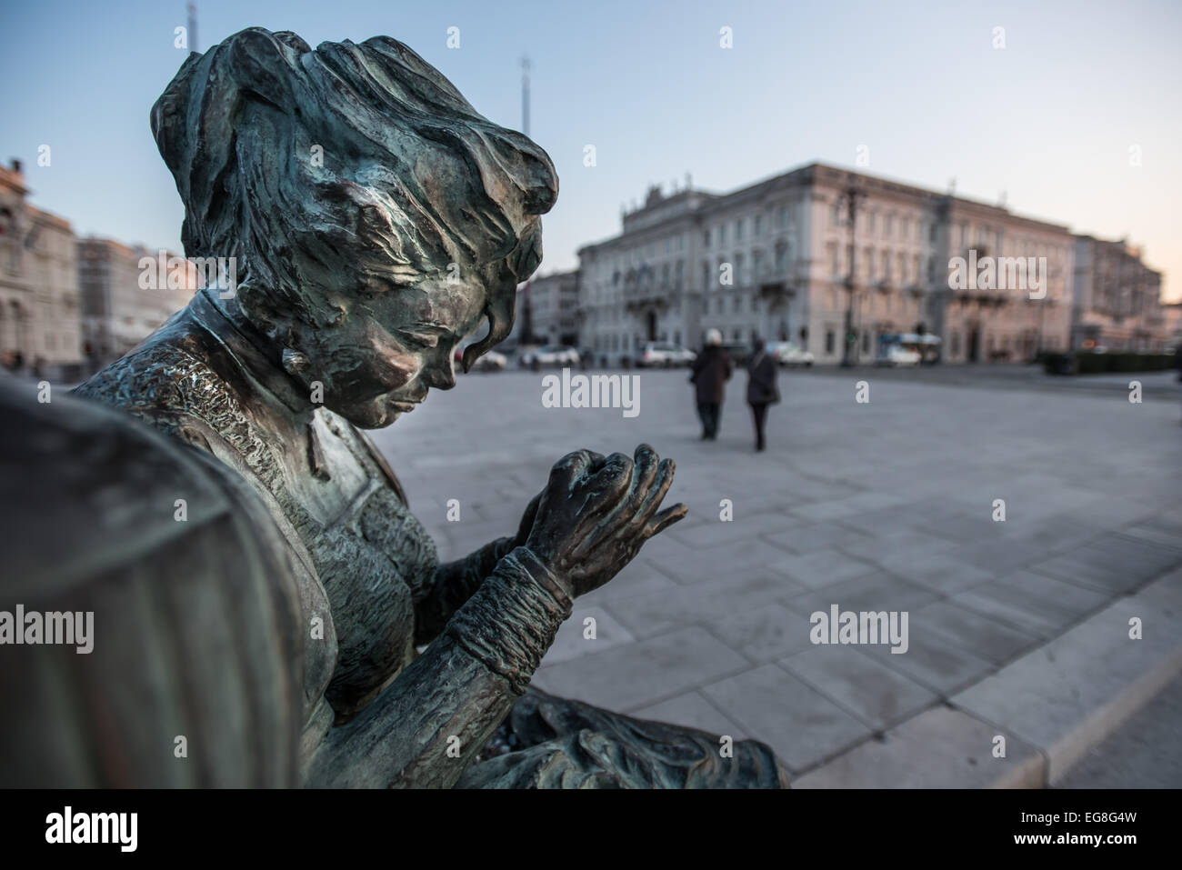 Trieste, Italy - The 'Sartine' statue is lighted from the last rays of ...