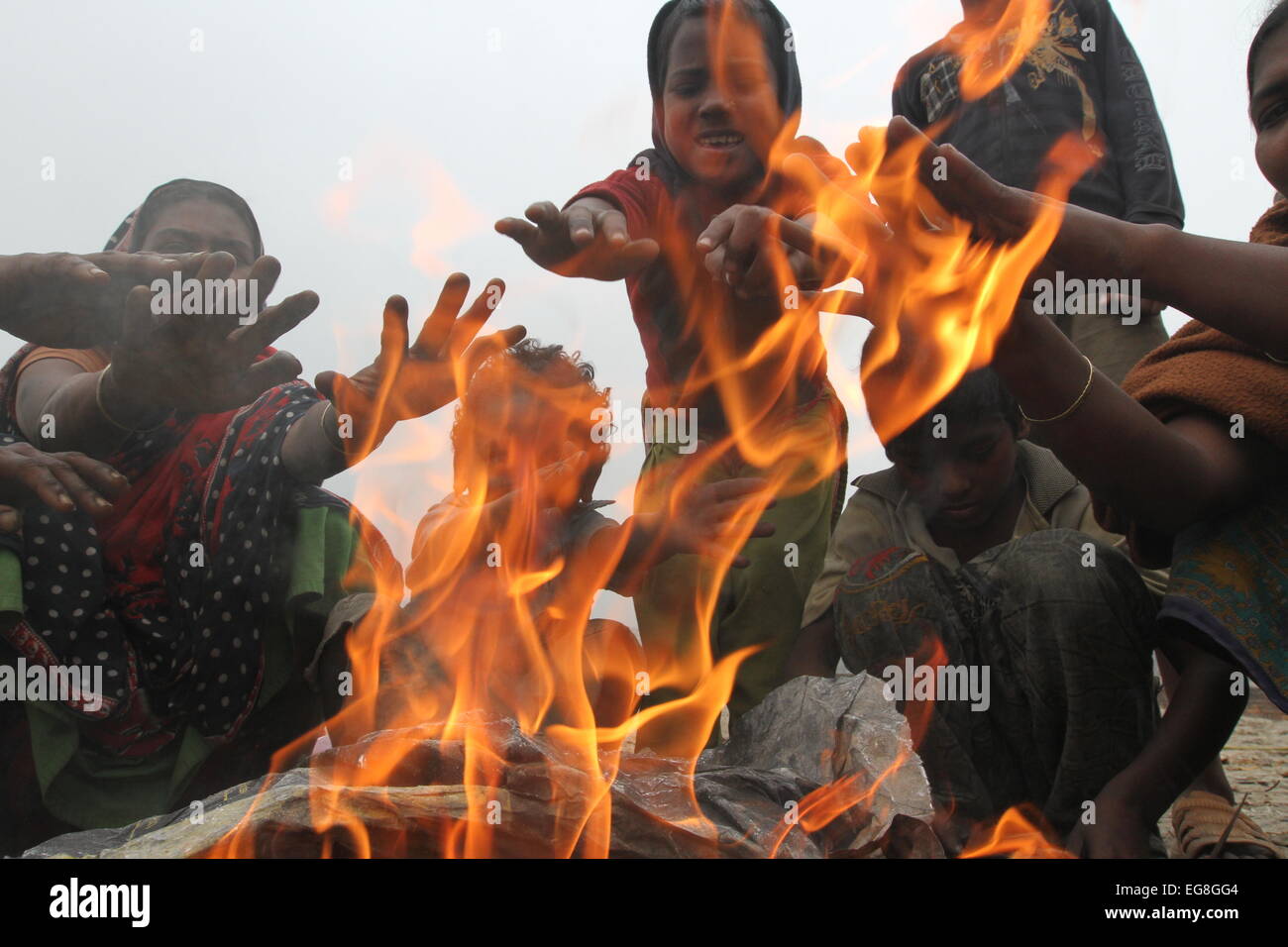 Homeless children create fire by using discarded wood or plastic to ...