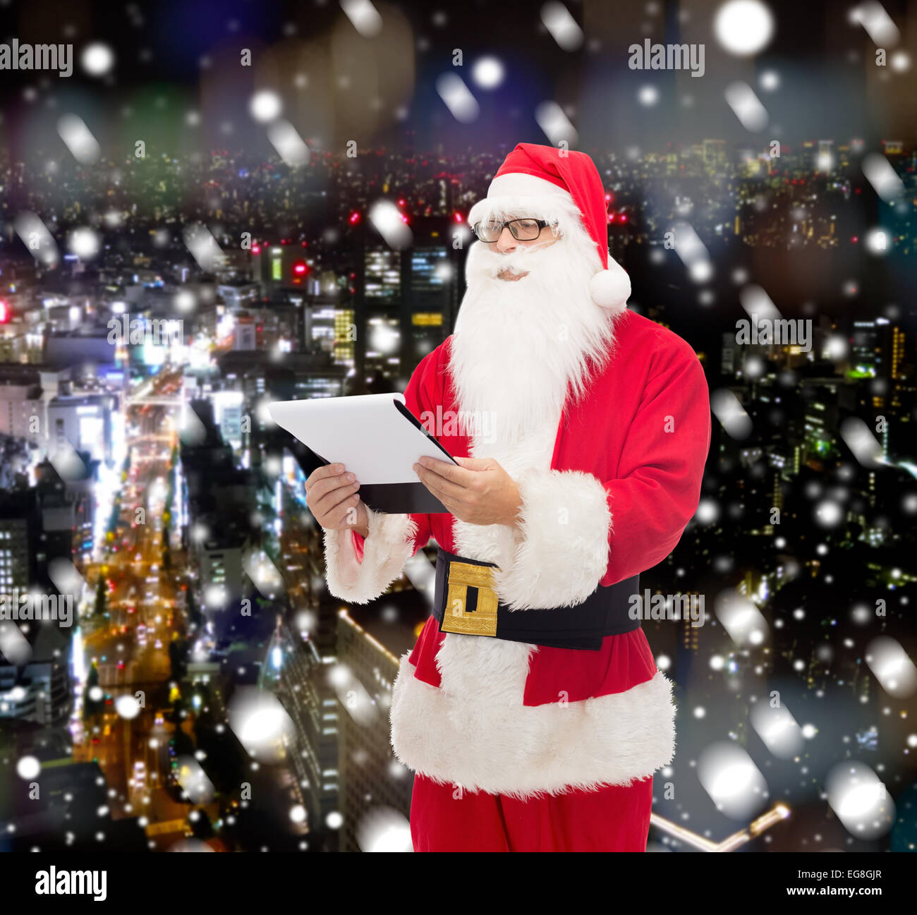 man in costume of santa claus with notepad Stock Photo - Alamy