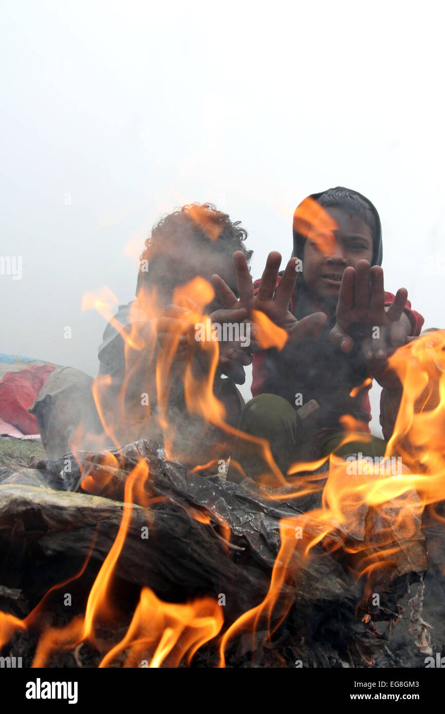 Homeless children create fire by using discarded wood or plastic to ...