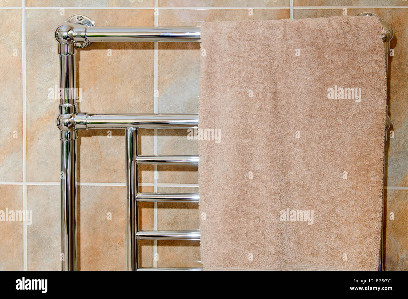 chrome bathroom towel rail / radiator Stock Photo - Alamy