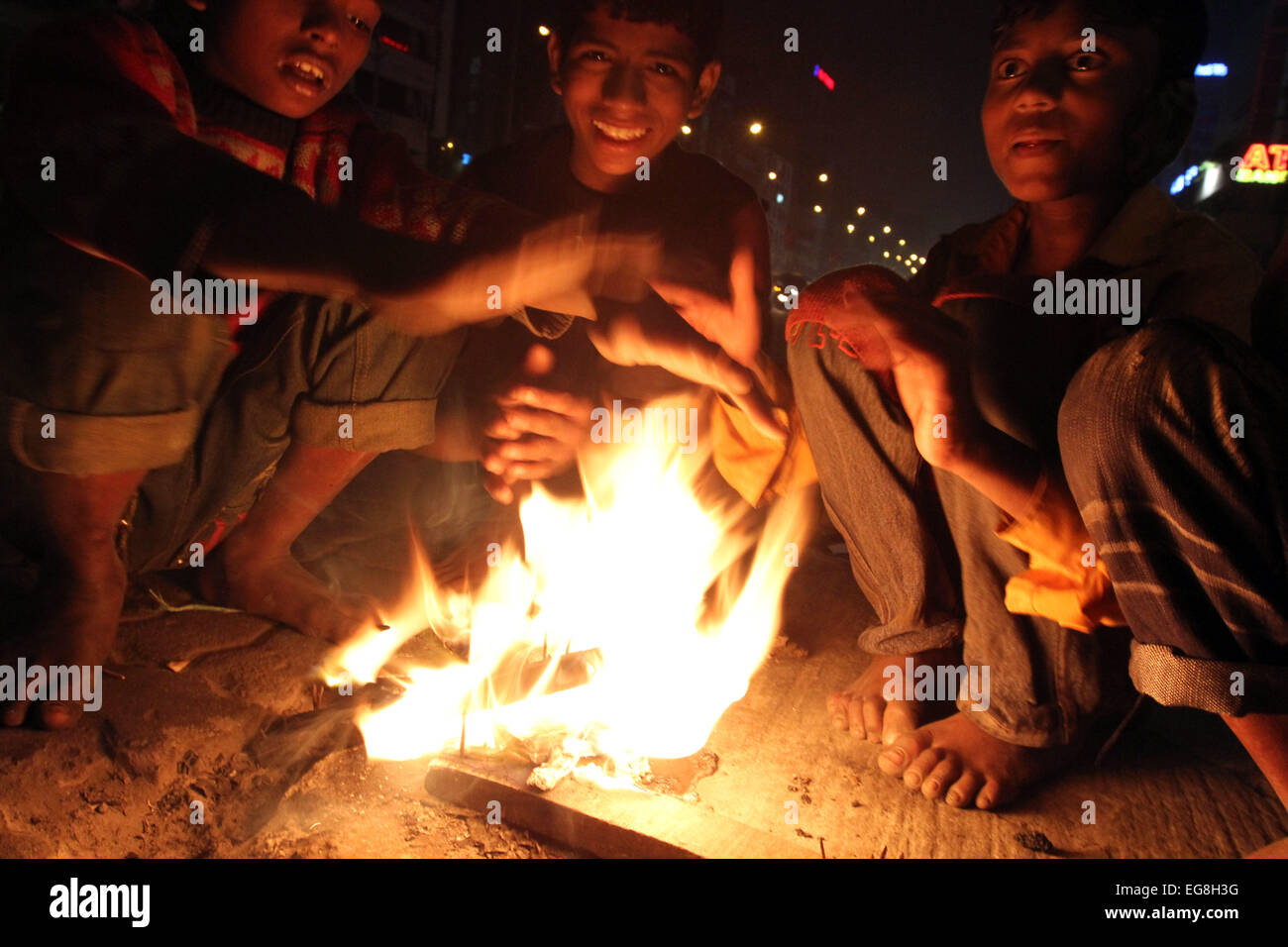 Homeless children create fire by using discarded wood or plastic to ...