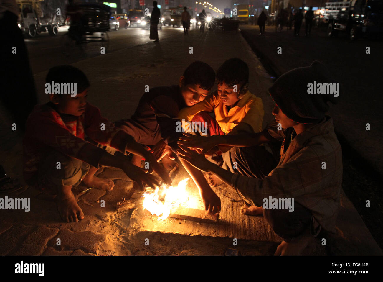 Homeless children create fire by using discarded wood or plastic to ...