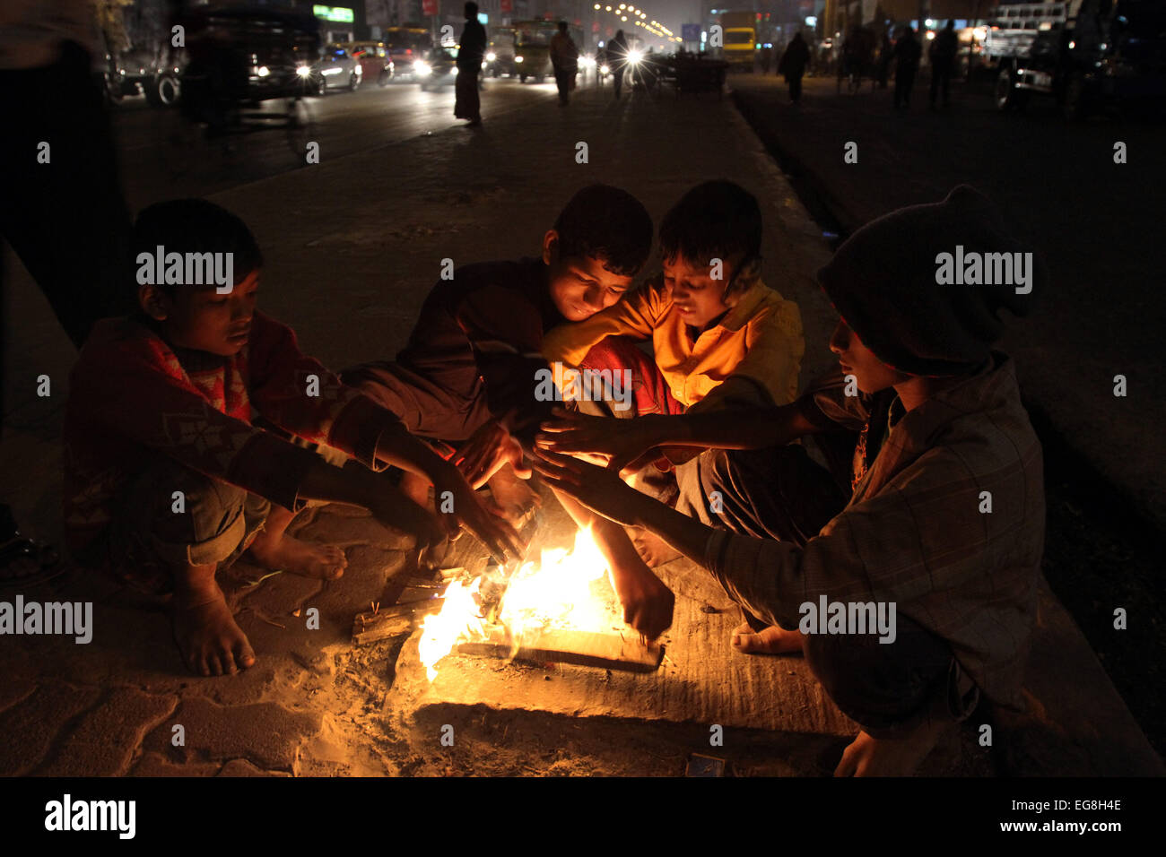 Homeless children create fire by using discarded wood or plastic to ...
