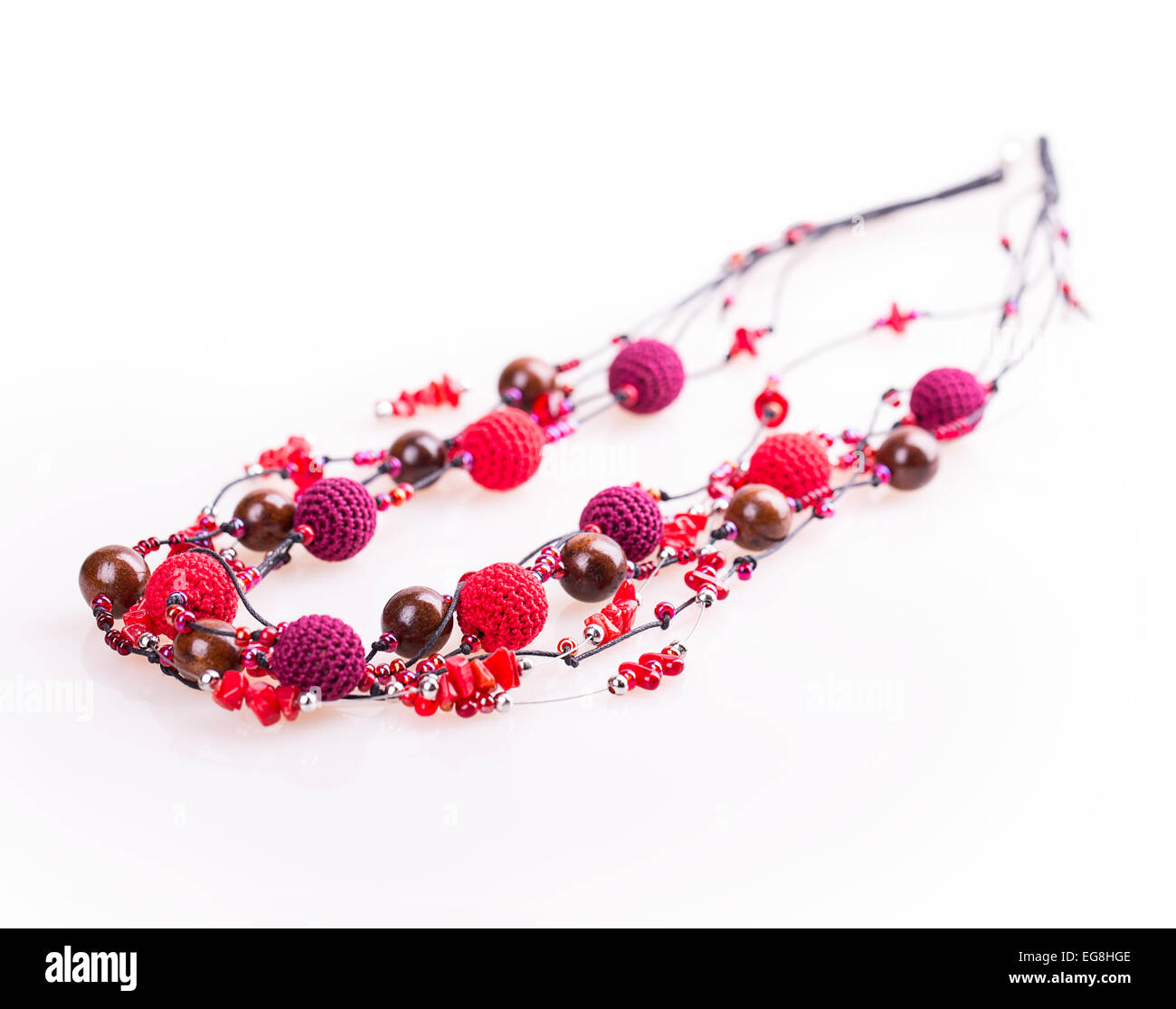 red beads Isolated on white background Stock Photo - Alamy