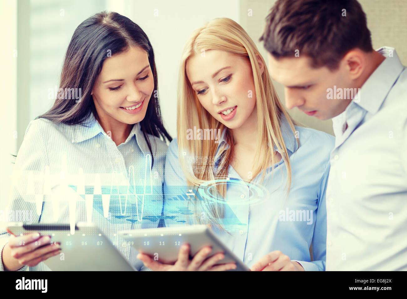 business team working with tablet pcs in office Stock Photo - Alamy