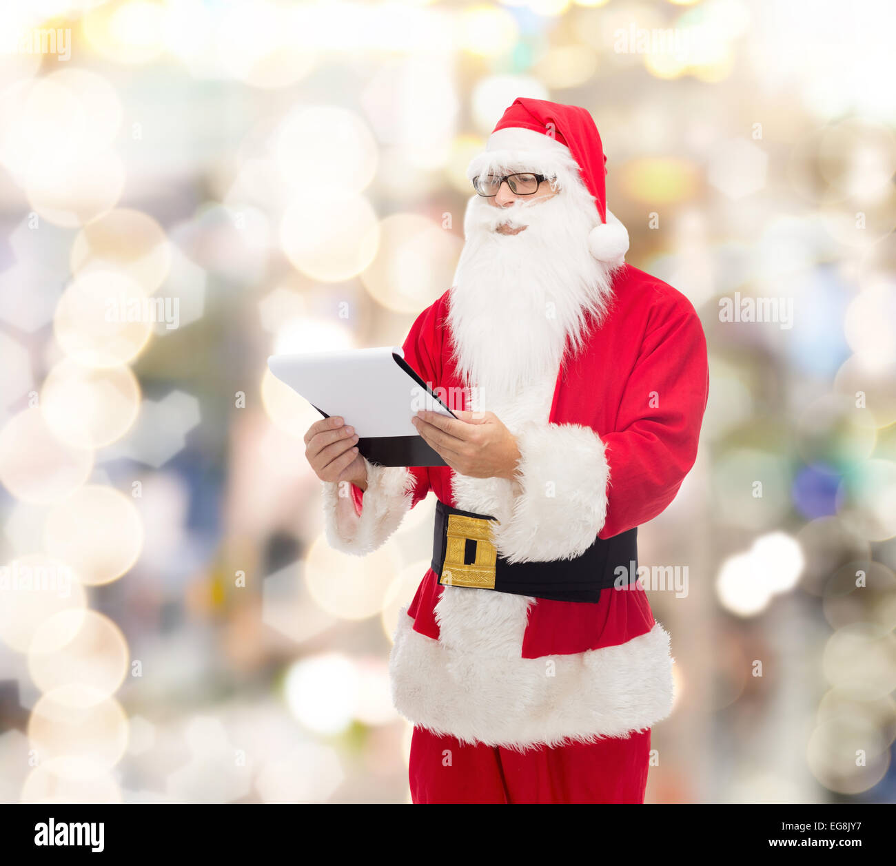 man in costume of santa claus with notepad Stock Photo - Alamy