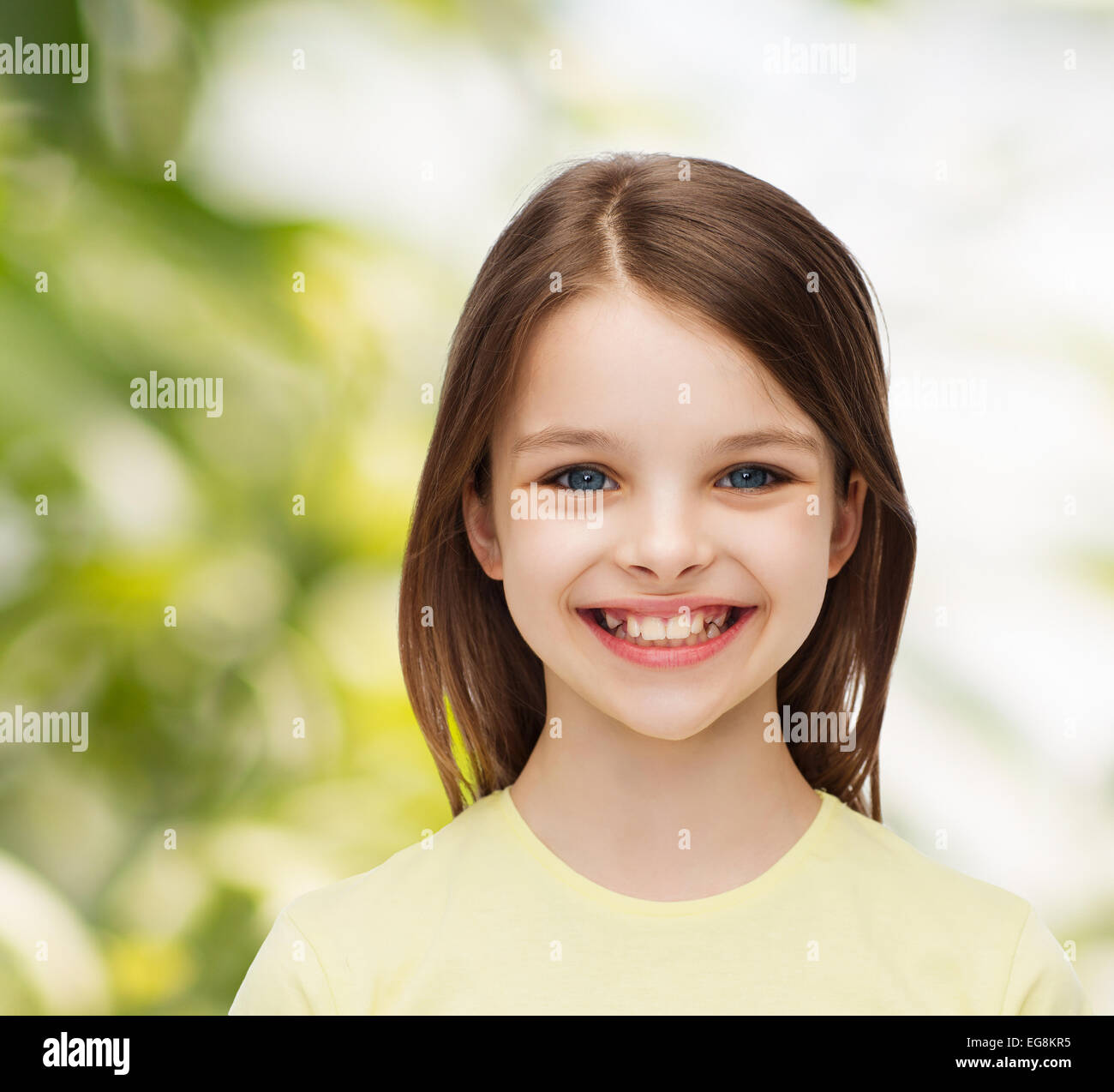 smiling little girl over white background Stock Photo - Alamy