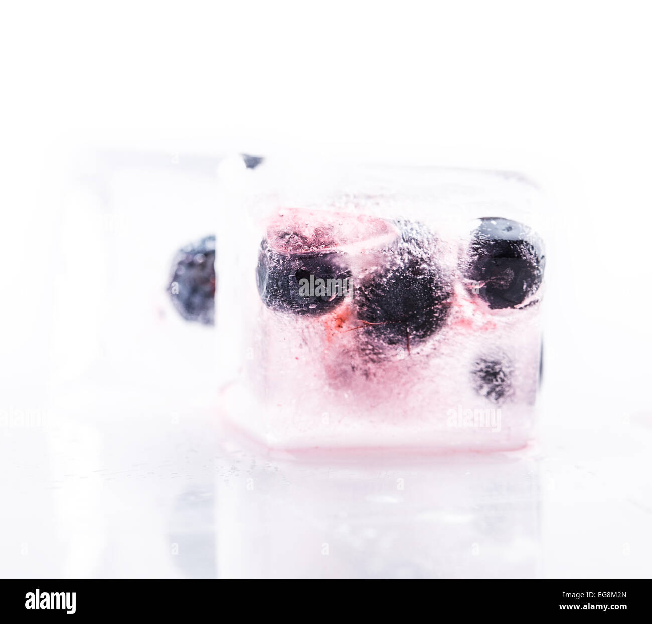 ice white frozen isolated blueberry cube fruit food Stock Photo - Alamy