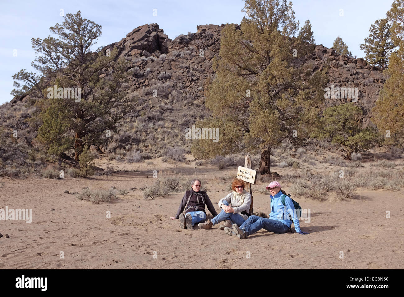 Hikers at Badlands Rock, on the Badlands Rock trail in Badlands ...