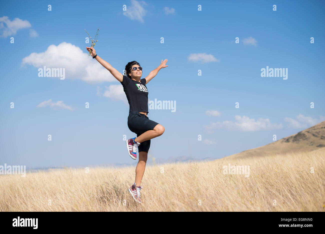 Happy woman jump Stock Photo - Alamy