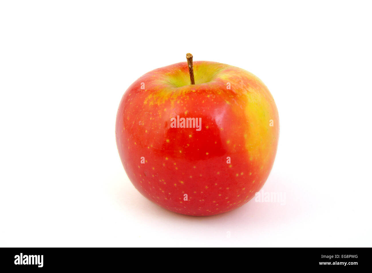 Red Arianne apple on a bright background Stock Photo - Alamy